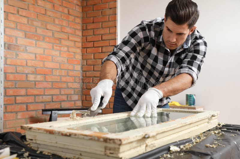 Man Repairing Old Damaged Window at Table Stock Photo - Image of person ...