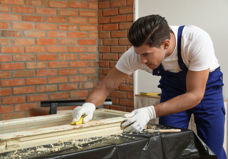 Man Repairing Old Damaged Window at Table Stock Photo - Image of ...