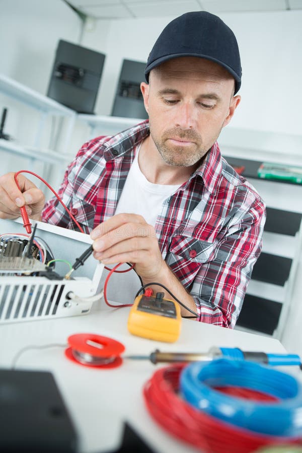 Man repairing radiator stock photo. Image of skill, tool - 270839612