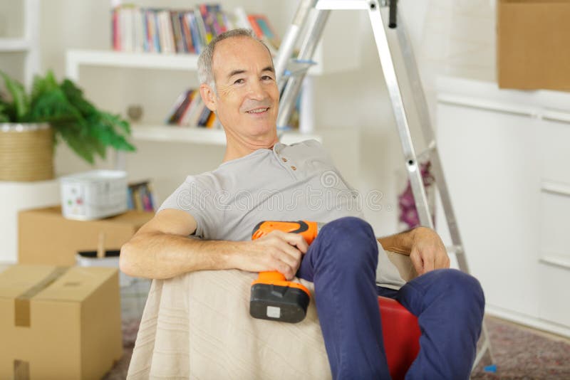 Man Repairing Something at Home Stock Image - Image of workingman ...