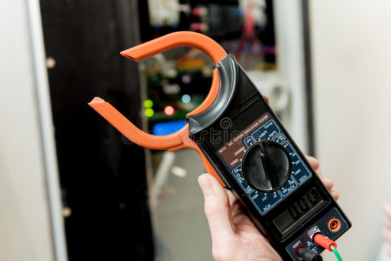 The Man is Repairing the Switchboard Voltage with Automatic Switches ...