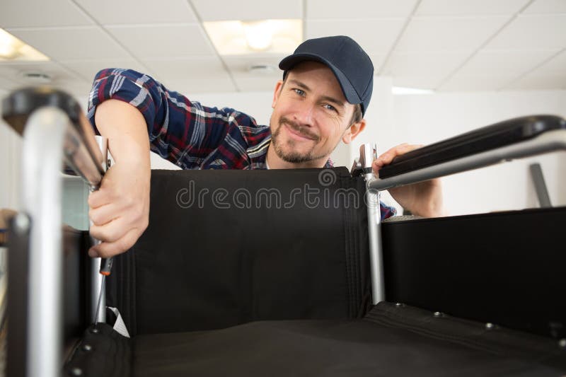 Man and Woman Using Machinery in Industrial Factory Stock Image - Image ...