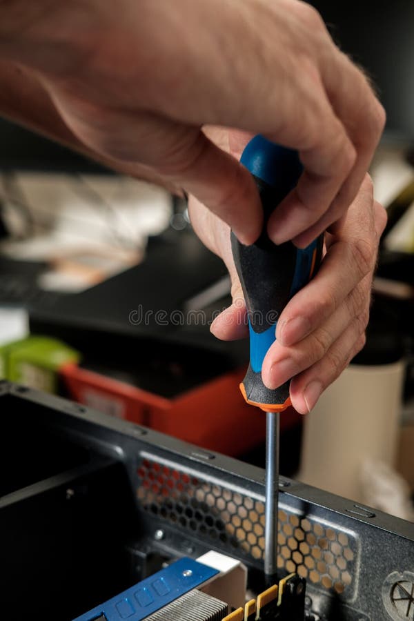 Man Repairs a Computer System Unit, Changes Parts, Video Card and Hard ...