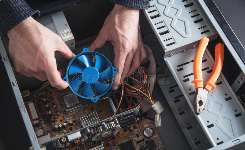 Man Repairs Cooling System of Computer Stock Photo - Image of system ...