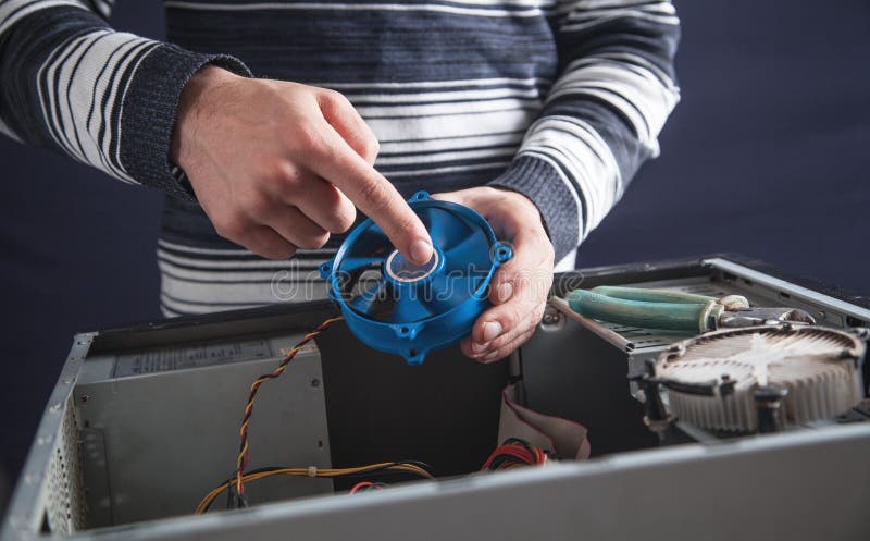 Man Repairs Cooling System of Computer Stock Photo - Image of memory ...