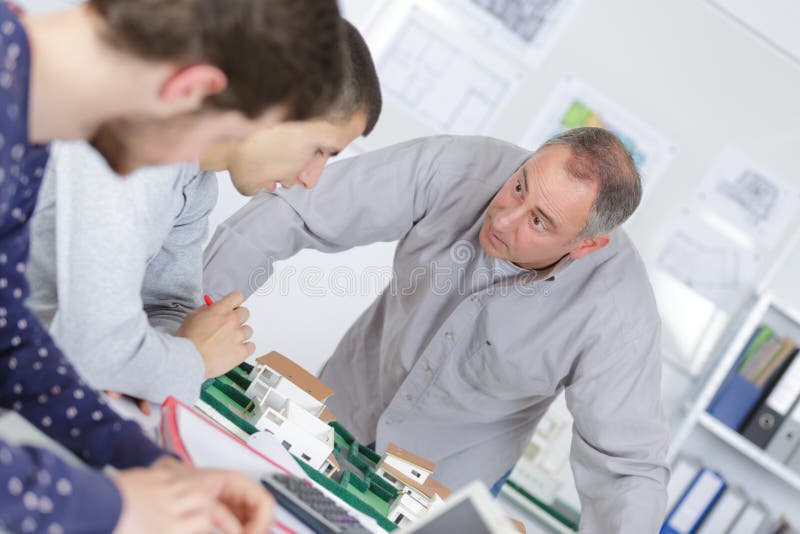 Man Reprimanding Younger Worker Stock Photo - Image of training, angry ...