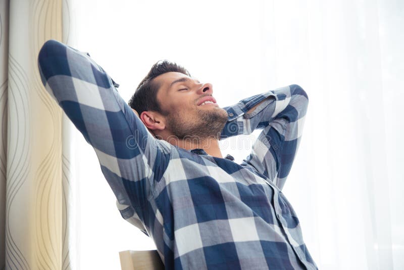 Man Resting on the Chair at Home Stock Image - Image of resting, casual ...