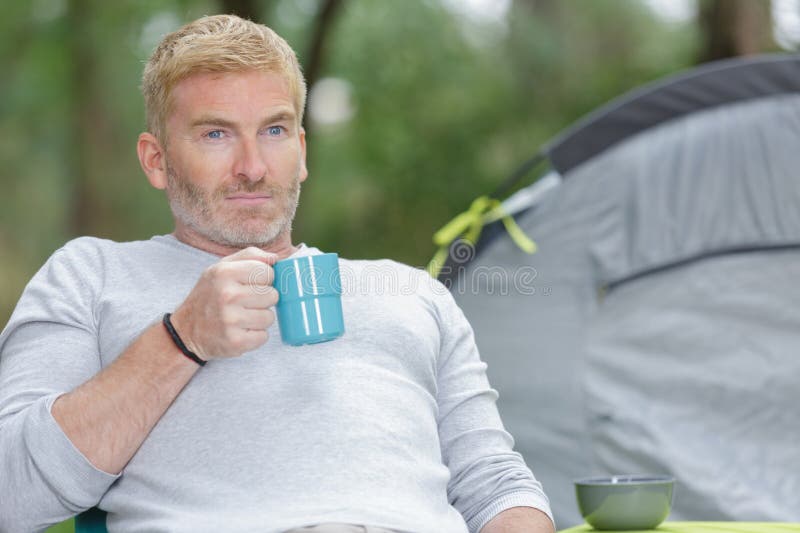 Man Resting in Forest in Tent Stock Photo - Image of travel, coffee ...