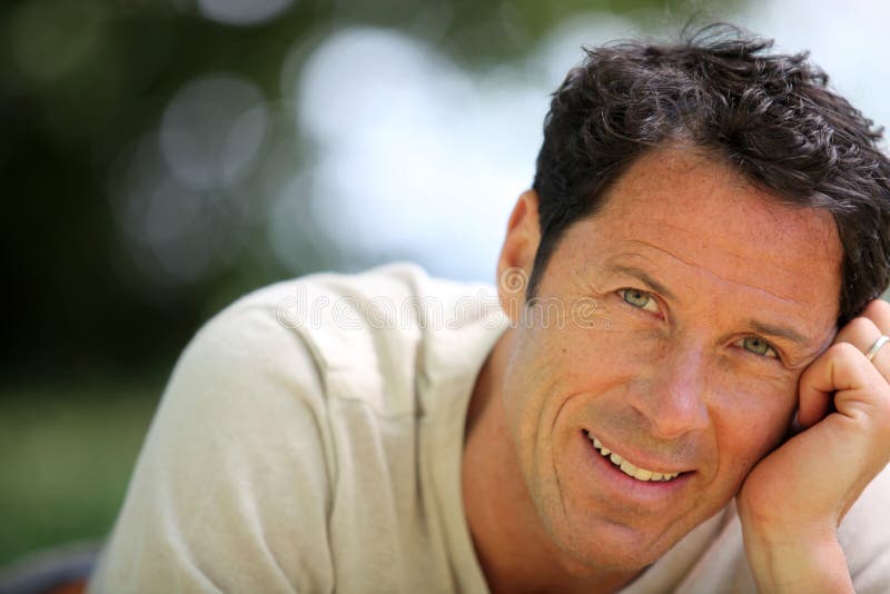 Man resting head in hand stock photo. Image of frontview - 35898738