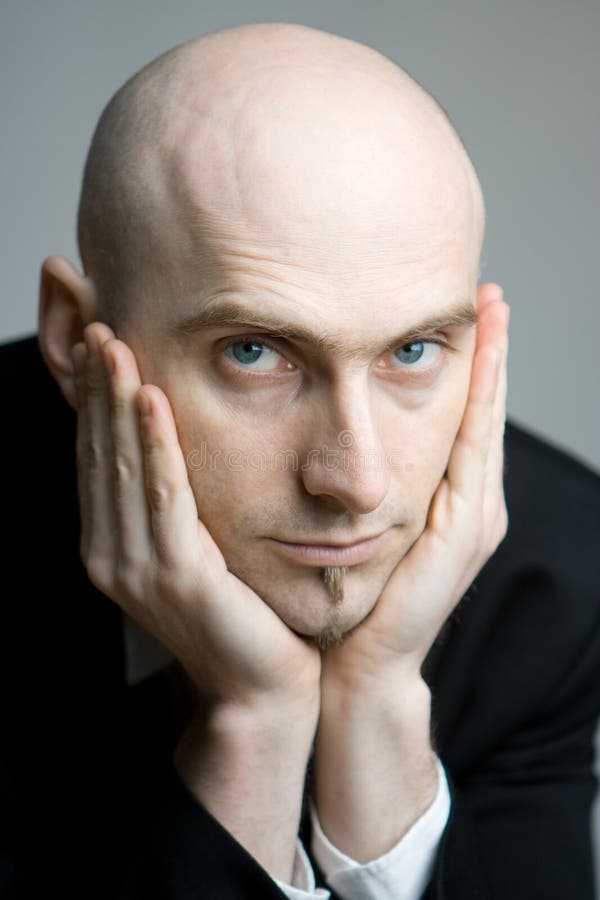 Man resting head in hands stock photo. Image of portrait - 5090598