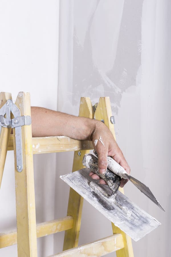 Man Resting with Masonry Tools in His Hand Stock Photo - Image of ...