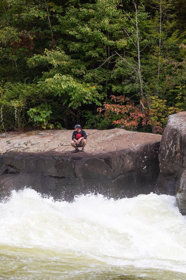Man Resting in the Middle of Rafting in a Flowing River Editorial ...