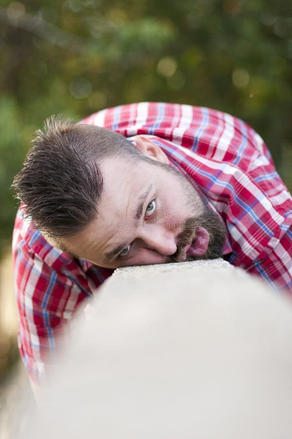 Man resting at the wall stock photo. Image of male, nature - 30514210