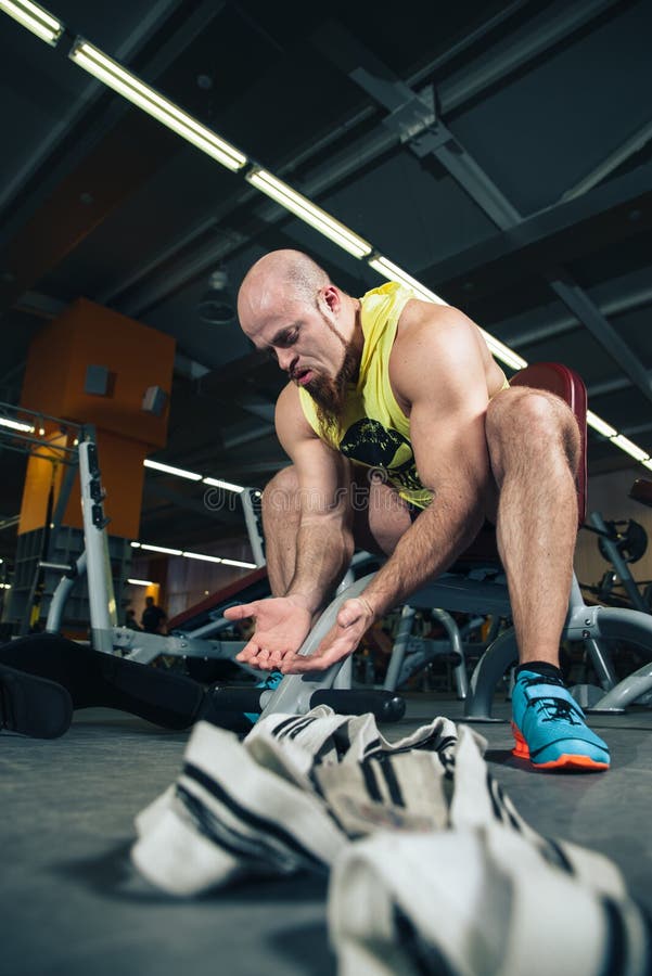 Man Rests in Gym after Having a Workout Stock Photo - Image of biceps ...