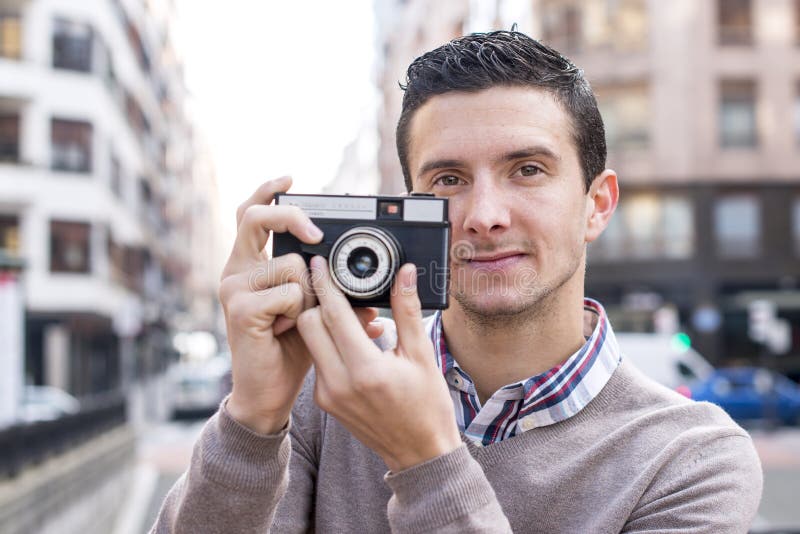 Man with Retro Camera in the Street. Stock Image - Image of portrait ...