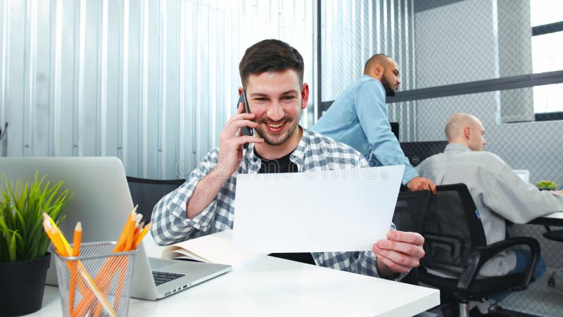 Man Reviews Documents at Desk in Modern Office Stock Video - Video of ...
