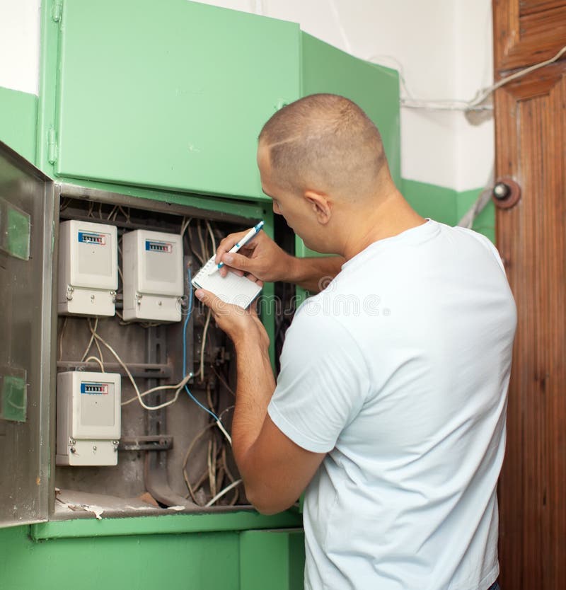 Technician Reading the Electricity Meter Stock Image - Image of ...