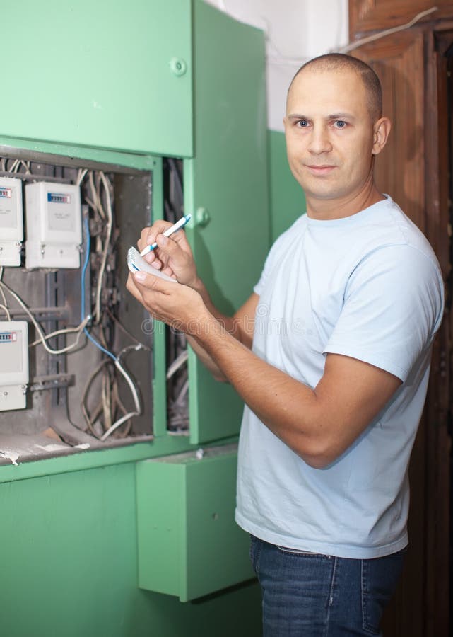 Man Rewrites Electric Power Meter Readings Stock Image - Image of light ...