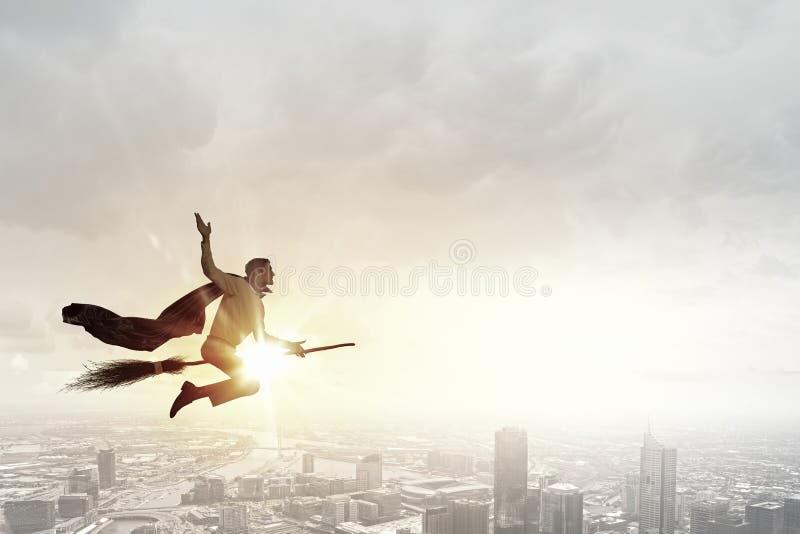 Man ride broom stock photo. Image of company, shirt, person - 57118558