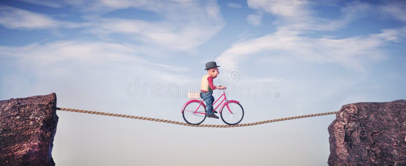 Man Ride a Cycle and Balancing a between Two Mountain Peaks Stock ...