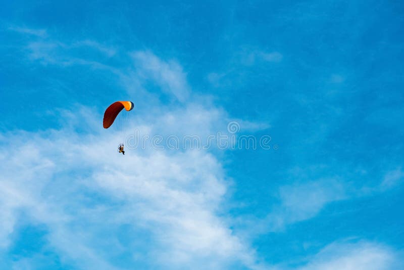Man Ride Paramotor Flying in the Sky Stock Image - Image of cloud ...