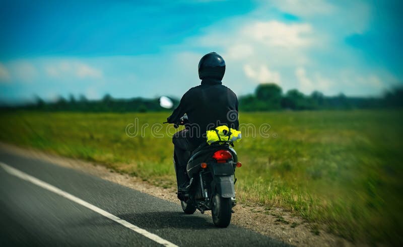 Man rides a motorcycle stock image. Image of motorcyclist - 298680413