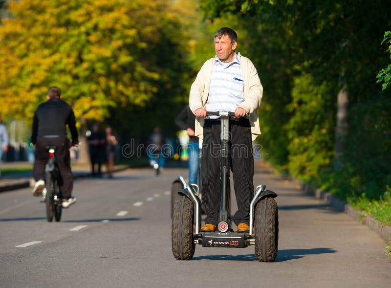 Man rides Segway editorial stock image. Image of modern - 26917959