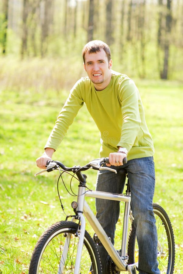 Man riding a bike stock photo. Image of adult, nature - 5023196