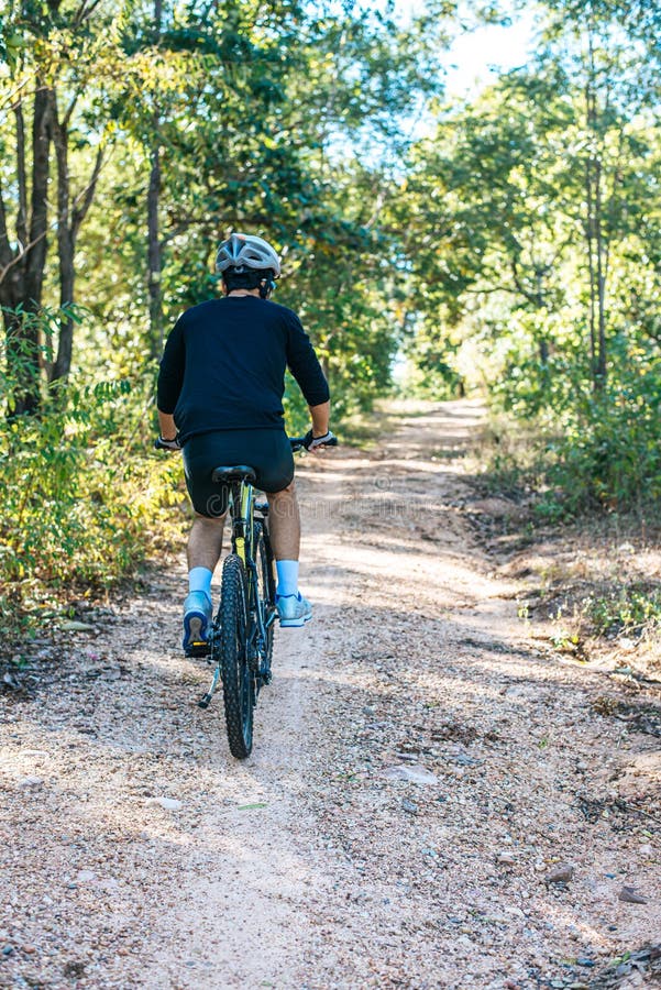 The Man Riding a Bike in a Mountain Path Stock Image - Image of biker ...