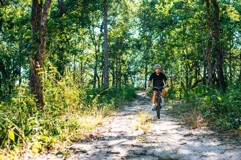 The Man Riding a Bike in a Mountain Path Stock Image - Image of bike ...