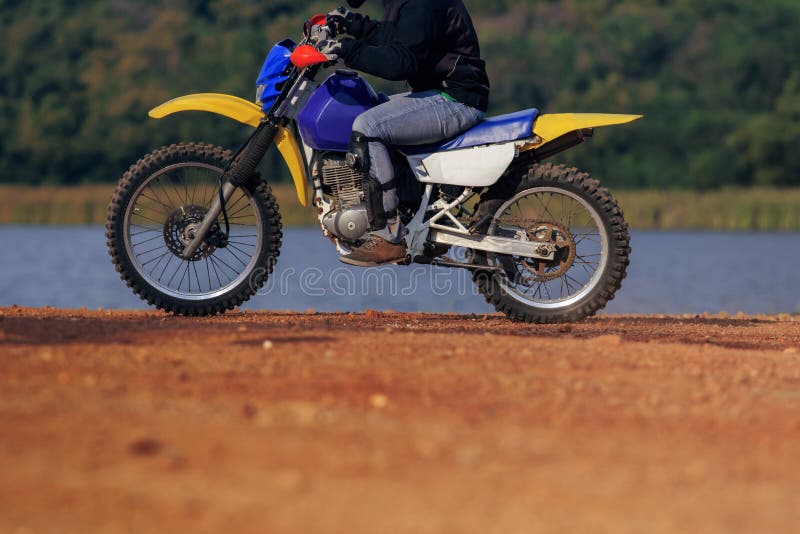 Man Riding Enduro Motorcycle on Dirt Field Stock Image - Image of dust ...