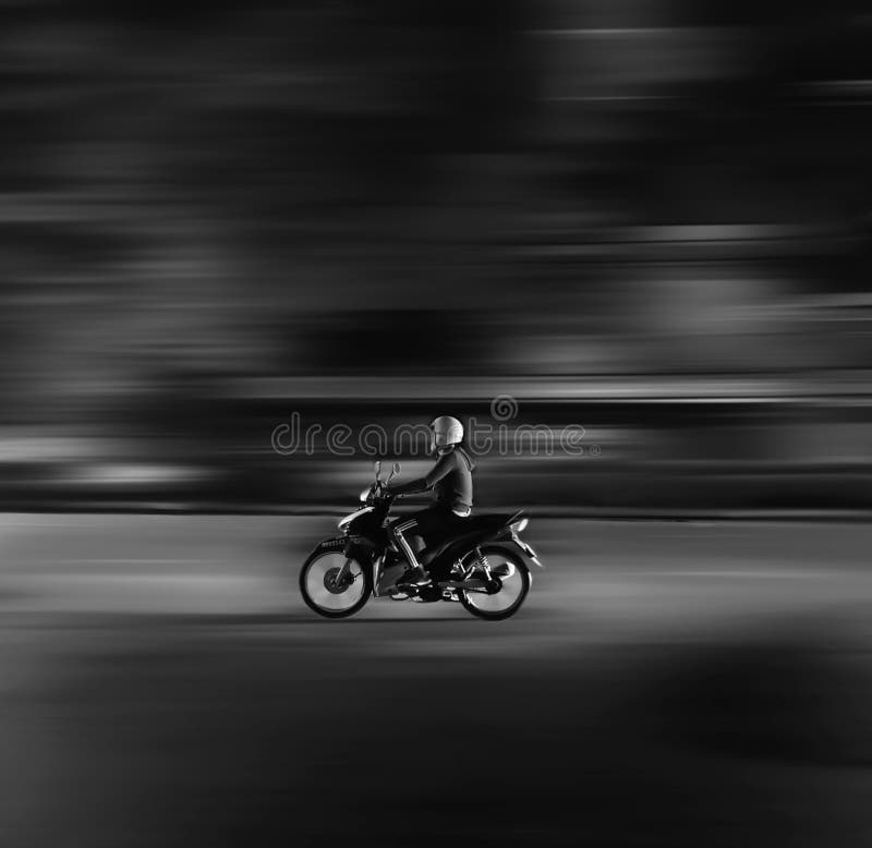 A Man Riding His Motorcycle in Full Speed Stock Image - Image of ...