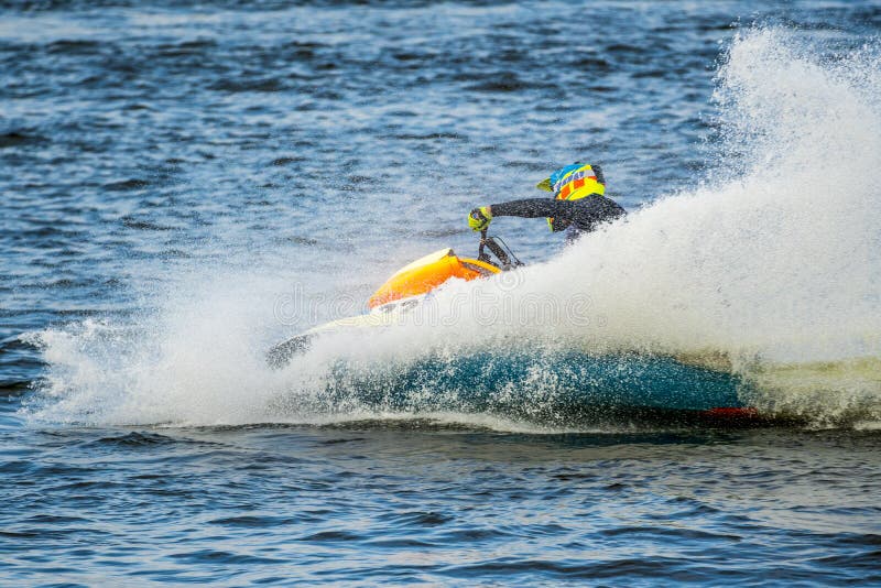 Man Riding a Jet Ski in the Lake during Race Stock Photo - Image of ...