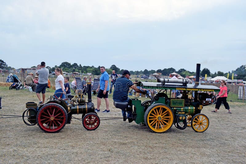 A Man Riding a Mini Steam Engine Editorial Photo - Image of people ...