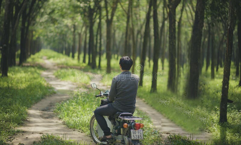 Man Riding A Moped Picture. Image: 109909667