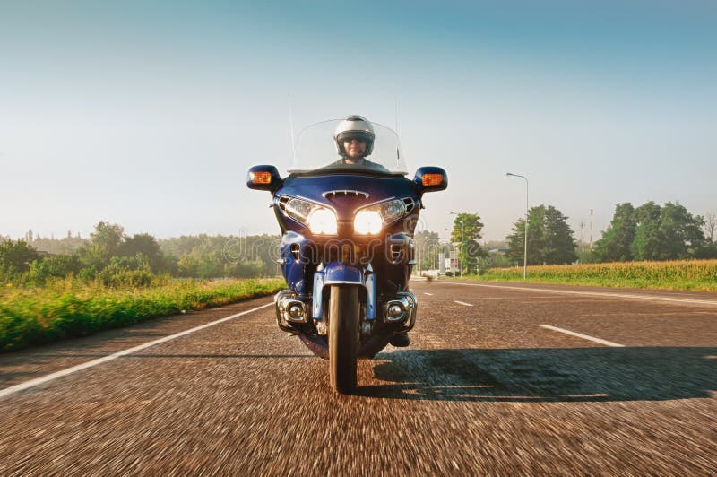 Man Riding a Motorcycle on an Open Road Stock Image - Image of motion ...