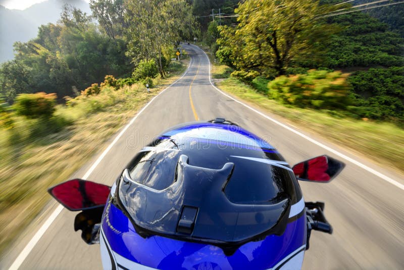 Man is Riding a Motorcycle on the Road Stock Photo - Image of lifestyle ...