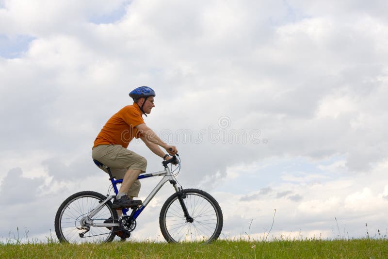 Man riding a mountain bike stock photo. Image of sport - 5777392