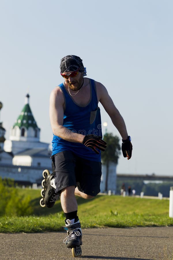 A Man Riding on Roller Skates in the City Stock Photo - Image of ...
