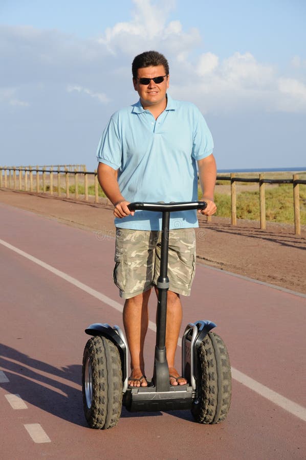 Man riding segway stock image. Image of male, driving - 11240437