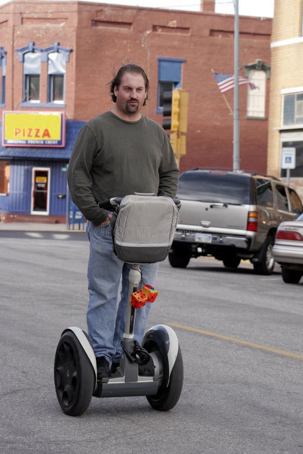 Man riding Segway stock image. Image of driving, human - 277825