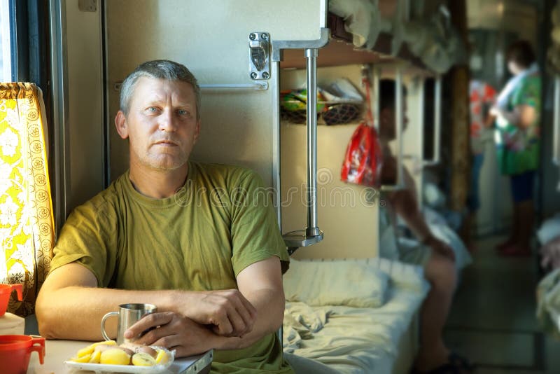 Man riding a sleeper train stock photo. Image of train - 20678674