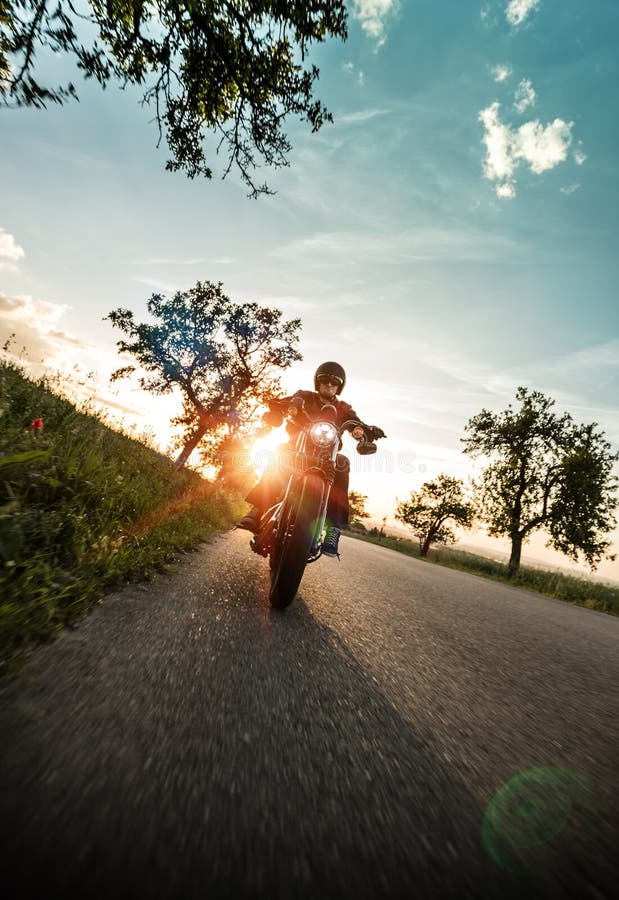 Man Riding Sportster Motorcycle during Sunset. Stock Image - Image of ...