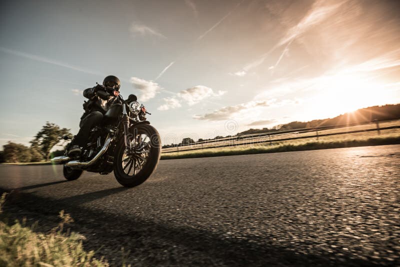 Man Riding Sportster Motorcycle during Sunset. Stock Photo - Image of ...