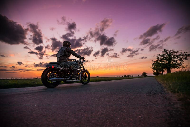 Man Riding Sportster Motorcycle during Sunset. Stock Photo - Image of ...