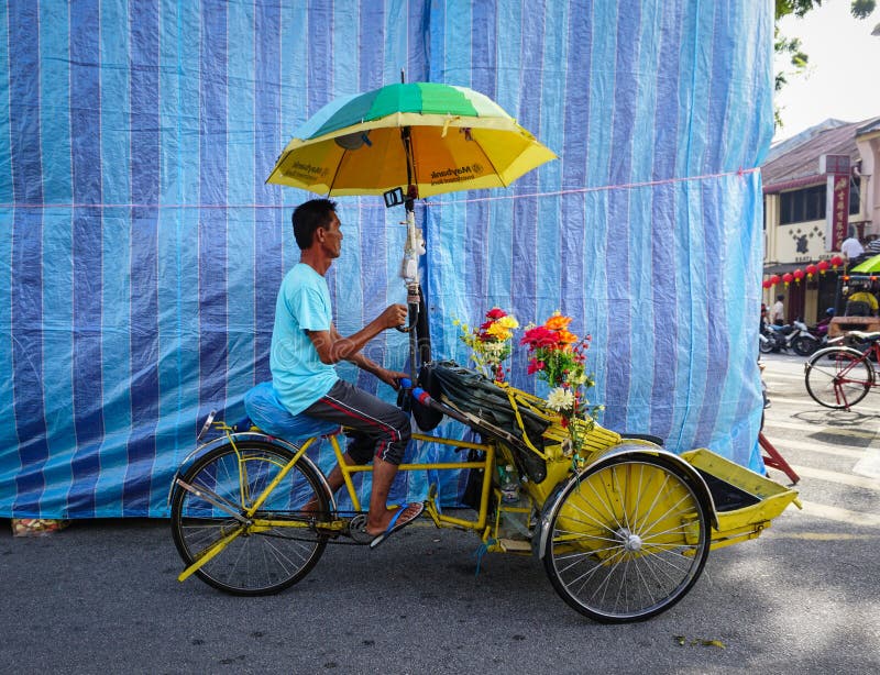 A Man Riding the Tricycle at Georgetown in Penang, Malaysia Editorial ...