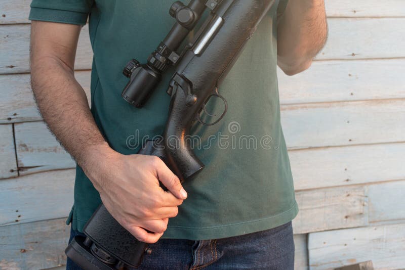 A man with a rifle stock image. Image of rifle, black - 190546209