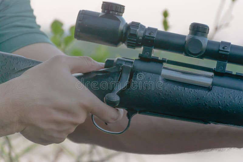 A man with a rifle stock image. Image of rifle, black - 190546209