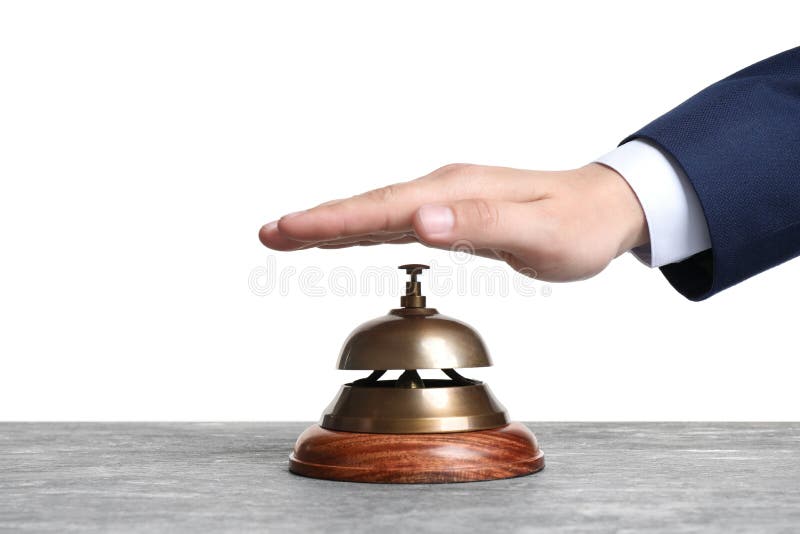 Man Ringing Hotel Service Bell at Stone Table Stock Photo - Image of ...