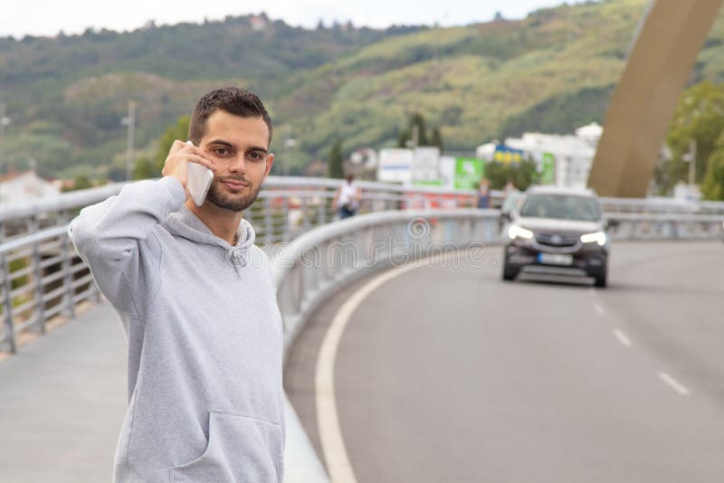 Man on the road calling stock photo. Image of lifestyle - 198642102